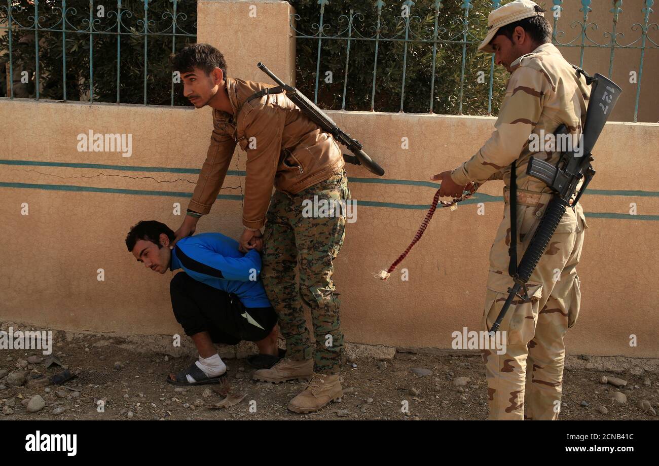 Soldiers handcuff hi-res stock photography and images - Alamy