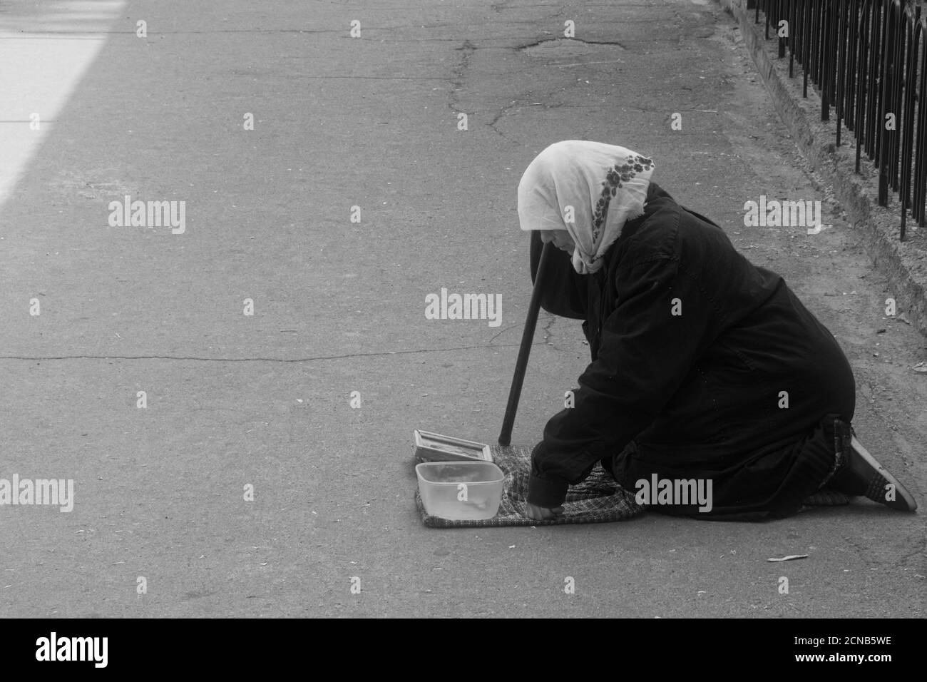 Human kneeling lifestyle Black and White Stock Photos & Images - Alamy