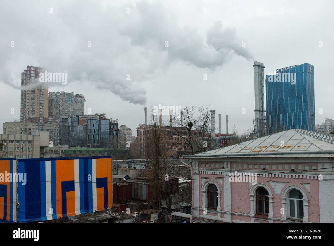 Kyiv, Ukraine, February 25, 2020. Smoke comes from chimneys over the ...