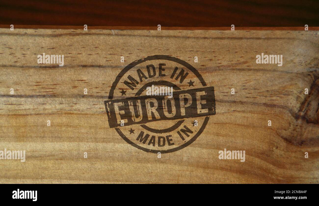 Made in Europe, EU, European Union stamp printed on wooden box. Factory ...