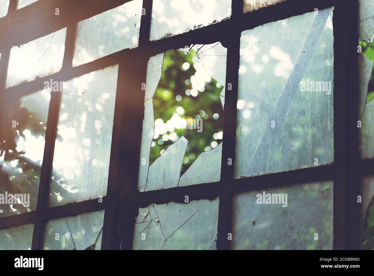 Old factory window with broken glass. Retro background Stock Photo - Alamy