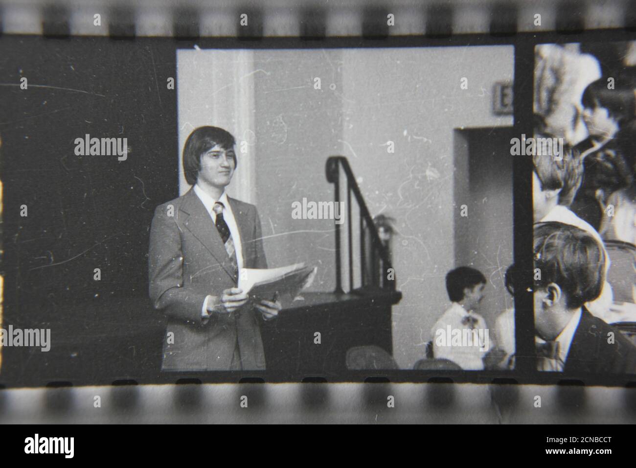 Fine 1970s vintage black and white photography of a man speaker giving ...