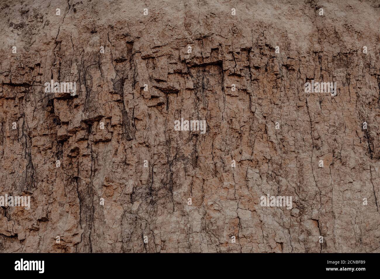 Wall cliff of the brown clay Stock Photo - Alamy