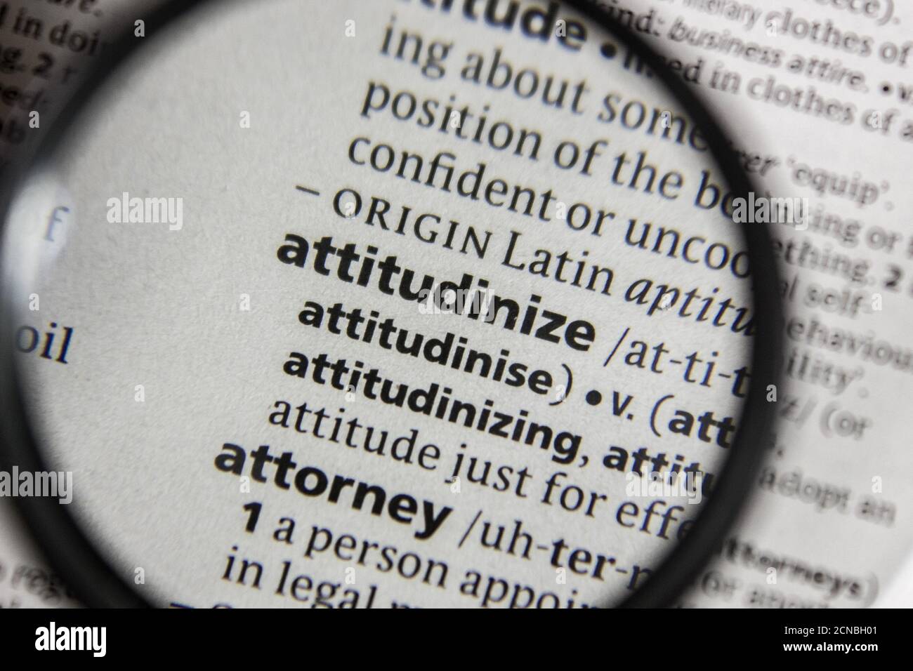The word or phrase attitudinize in a dictionary book Stock Photo - Alamy