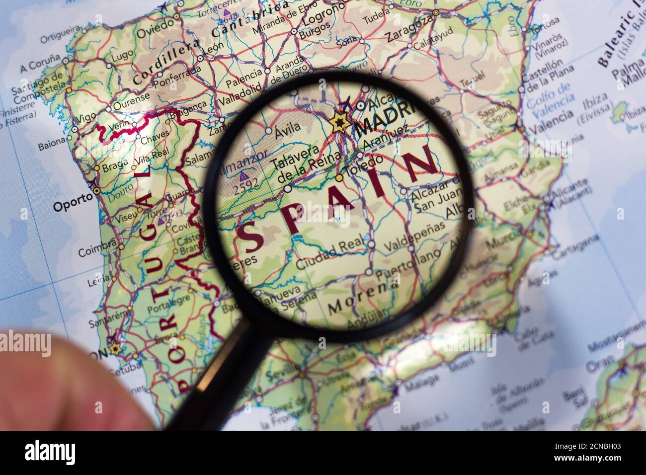 Spain on the map of the world or atlas Stock Photo - Alamy