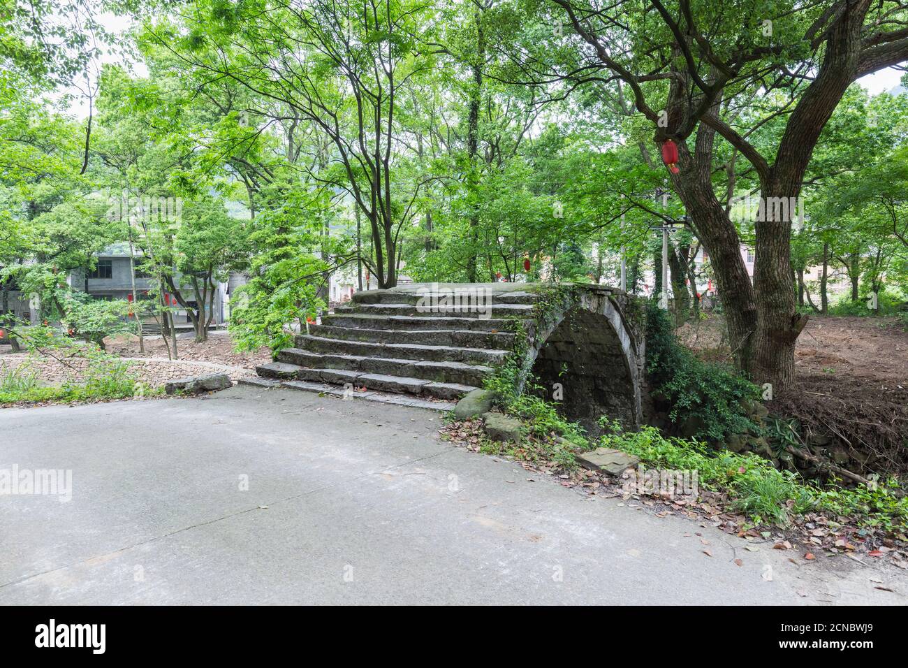 ancient stone arch bridge in spring Stock Photo - Alamy