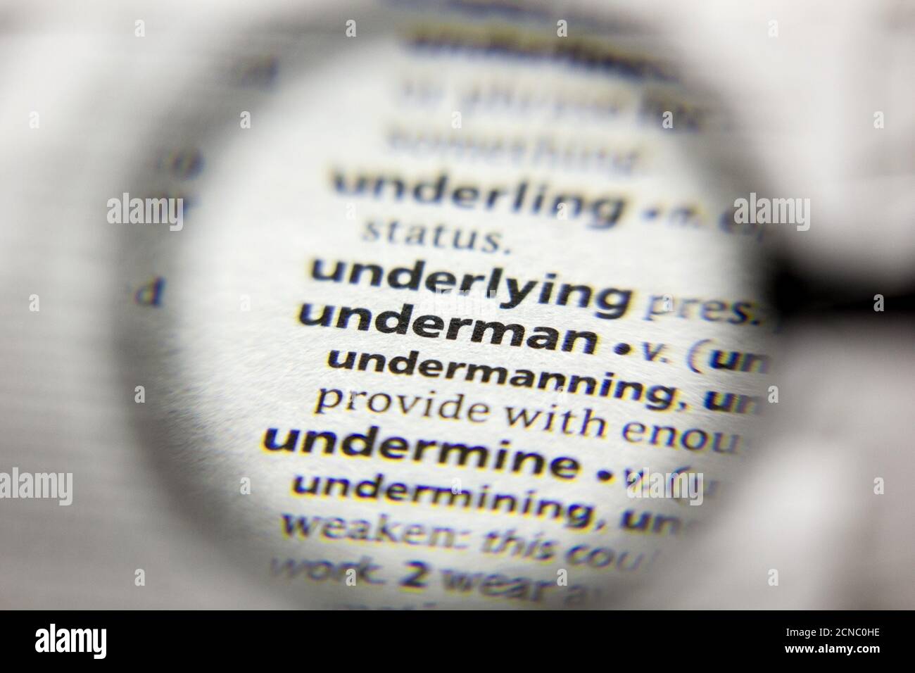 The word or phrase Underman in a dictionary Stock Photo - Alamy