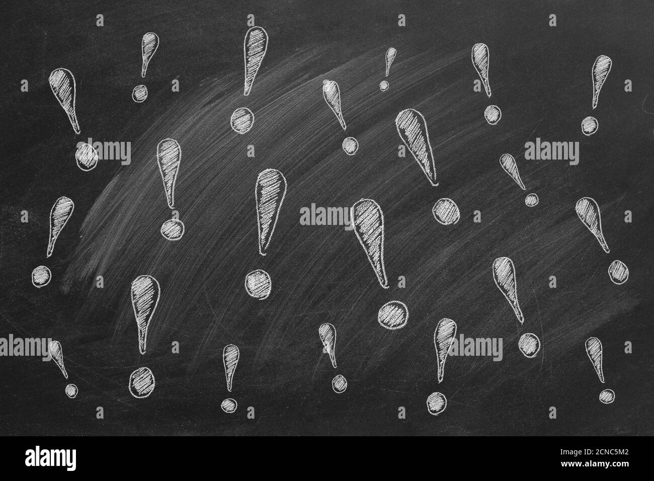 Exclamation marks drawn in chalk on a blackboard Stock Photo - Alamy