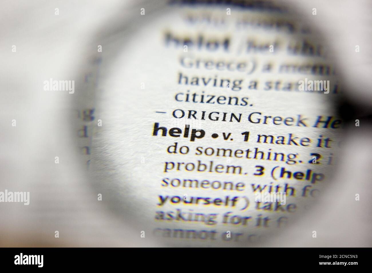 The word or phrase Help in a dictionary Stock Photo - Alamy