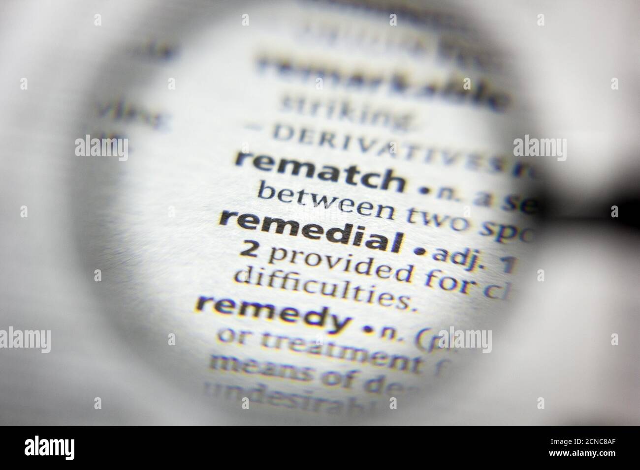 The word or phrase Remedial in a dictionary Stock Photo - Alamy