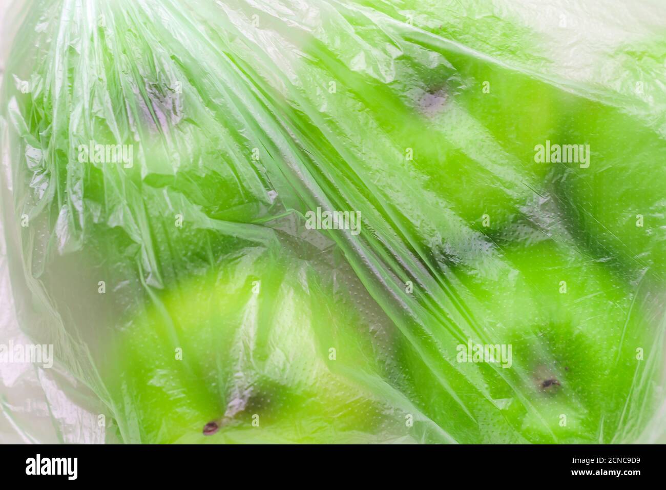 Apples In Plastic Packaging Bags High Resolution Stock Photography and ...