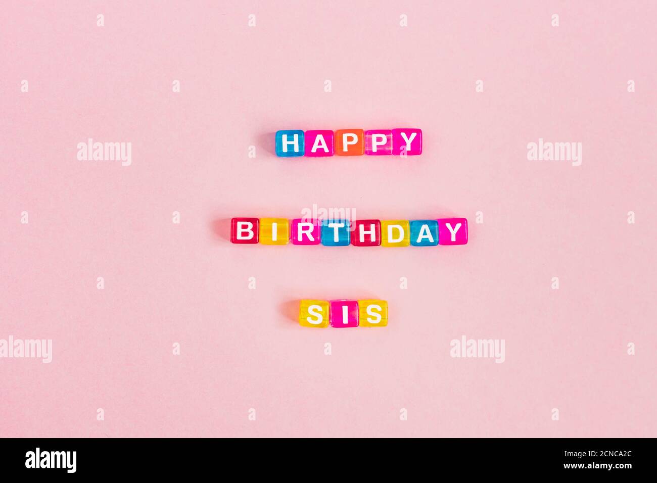 Happy birthday sis inscription made of colorful cube beads with letters ...