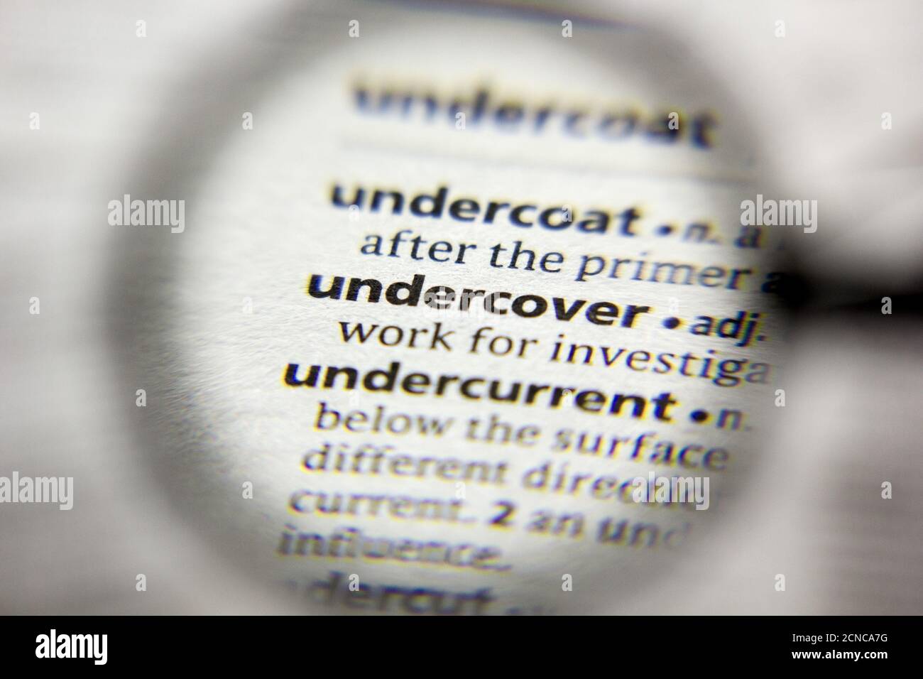 The word or phrase Undercover in a dictionary Stock Photo - Alamy