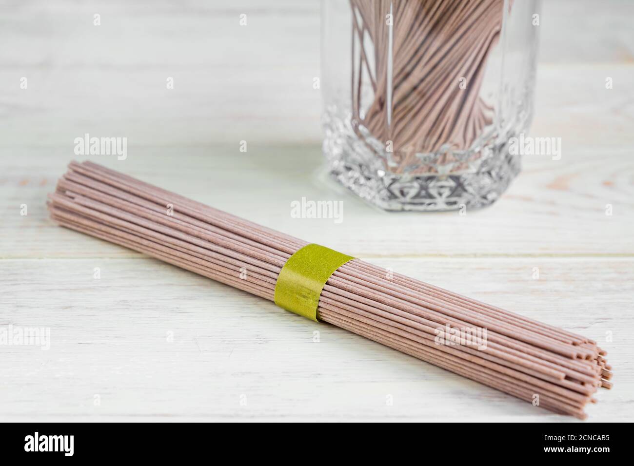 Raw soba noodle on whte wooden table. Traditional Japanese food. Top ...