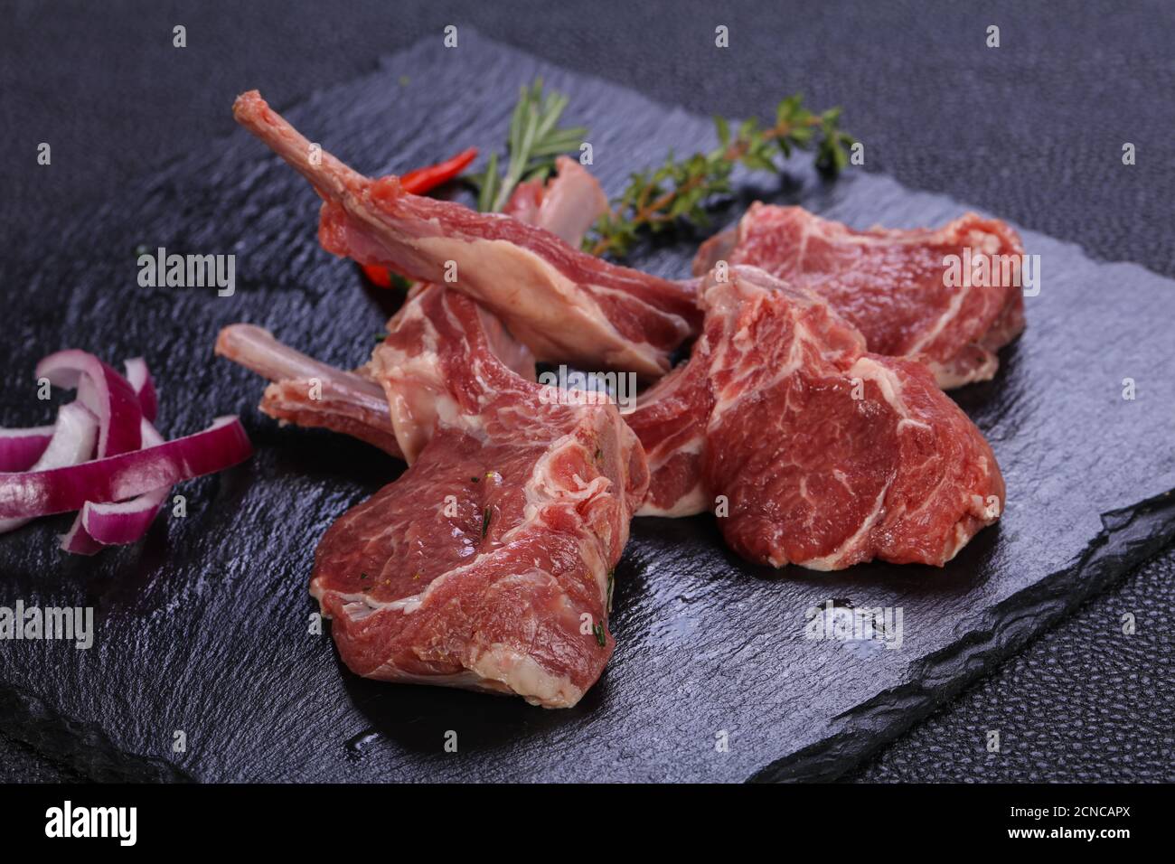 Raw rack of lamb ready for grill Stock Photo - Alamy