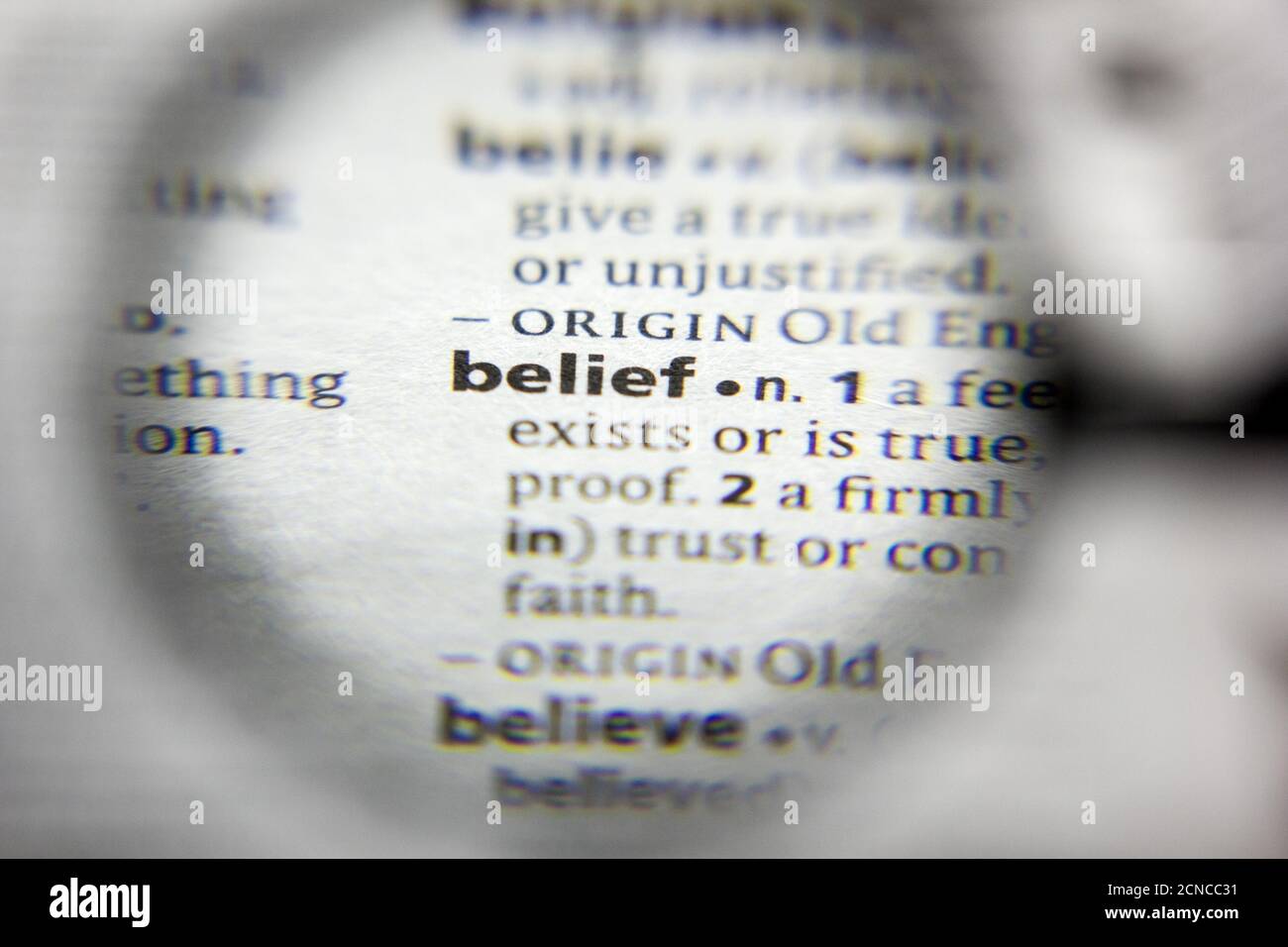 The word or phrase belief in a dictionary Stock Photo - Alamy