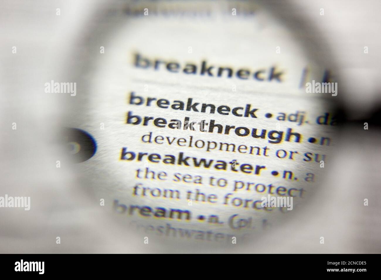 The word or phrase Breakthrough in a dictionary Stock Photo - Alamy