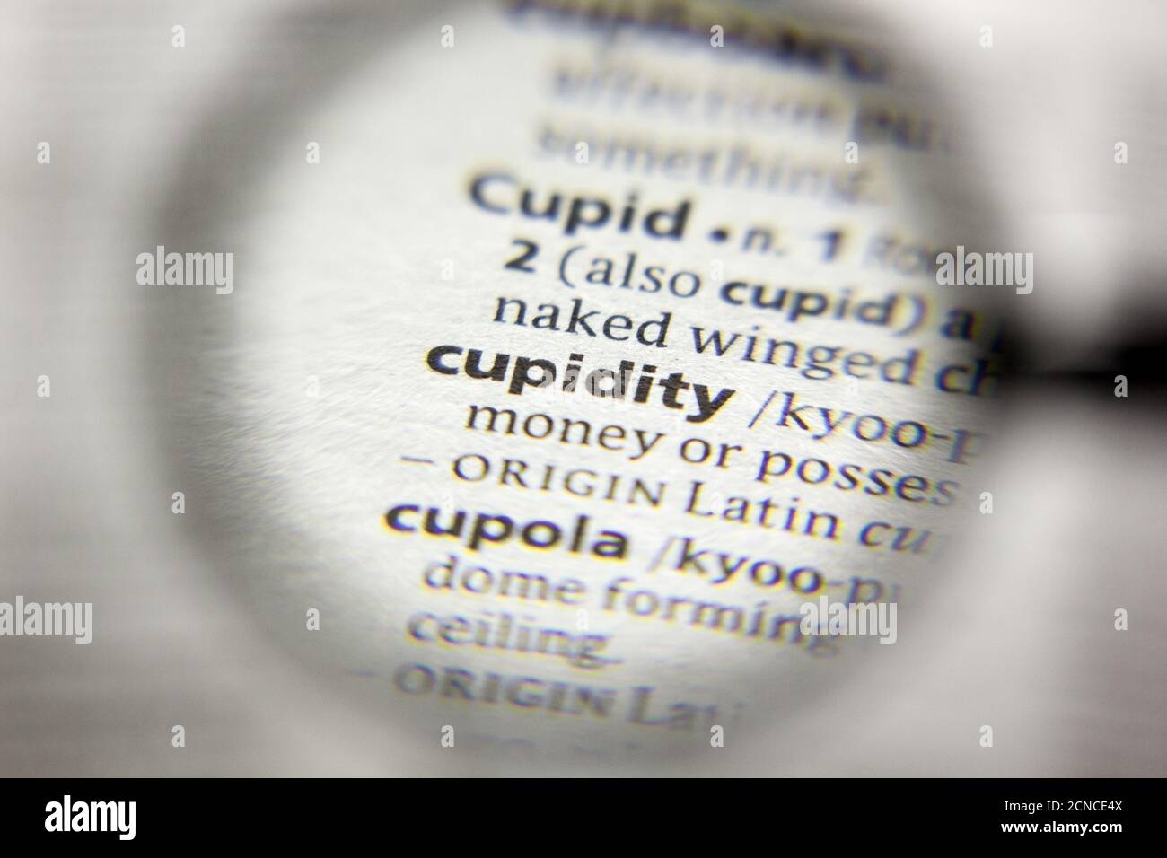 Cupidity hi-res stock photography and images - Alamy