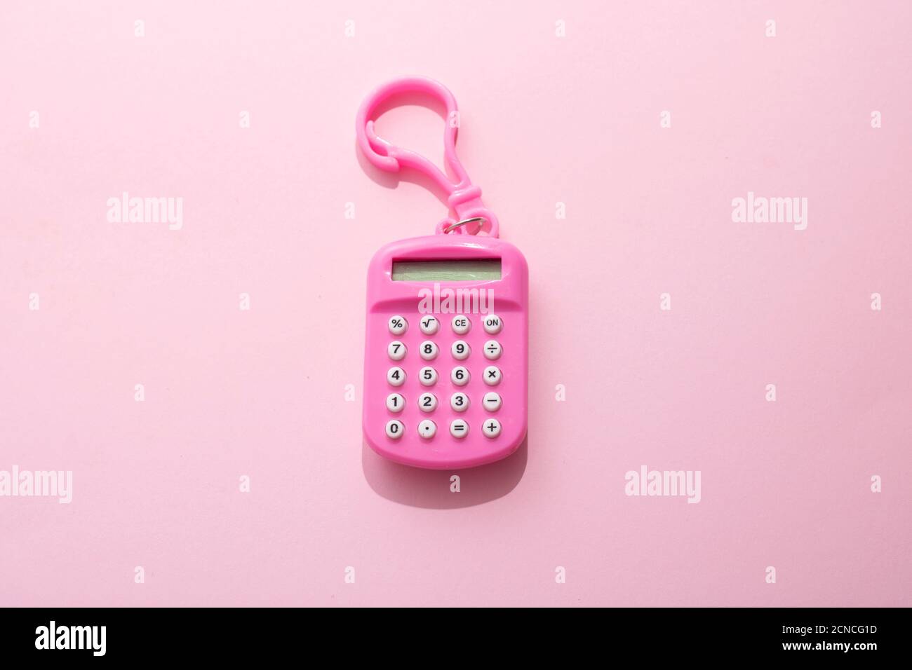 Kids pink calculator with white display Stock Photo - Alamy