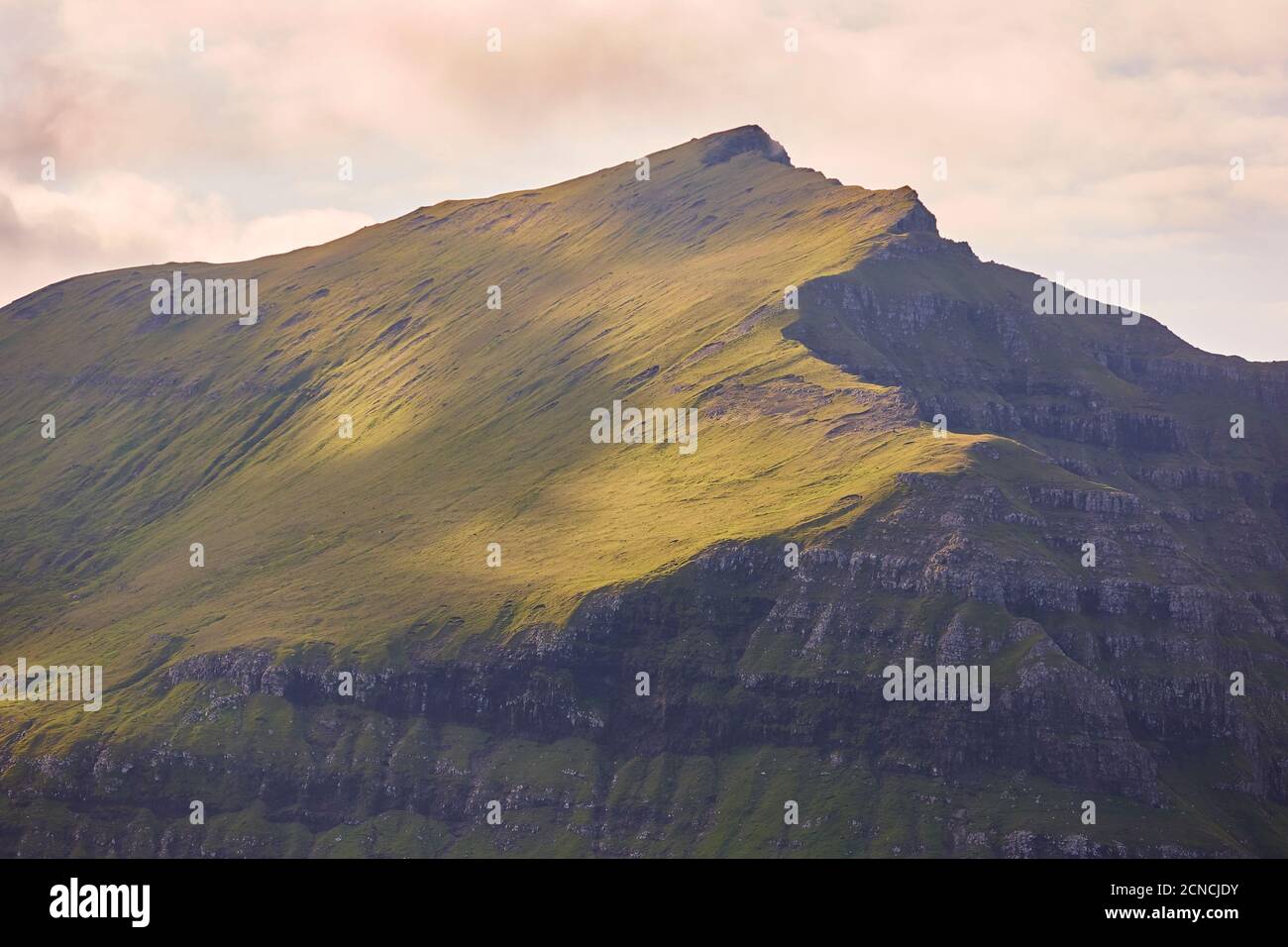 Picturesque green mountain peak landscape in Faroe islands. Sudoroy ...
