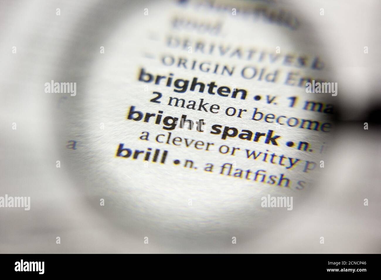 The word or phrase Bright spark in a dictionary Stock Photo - Alamy