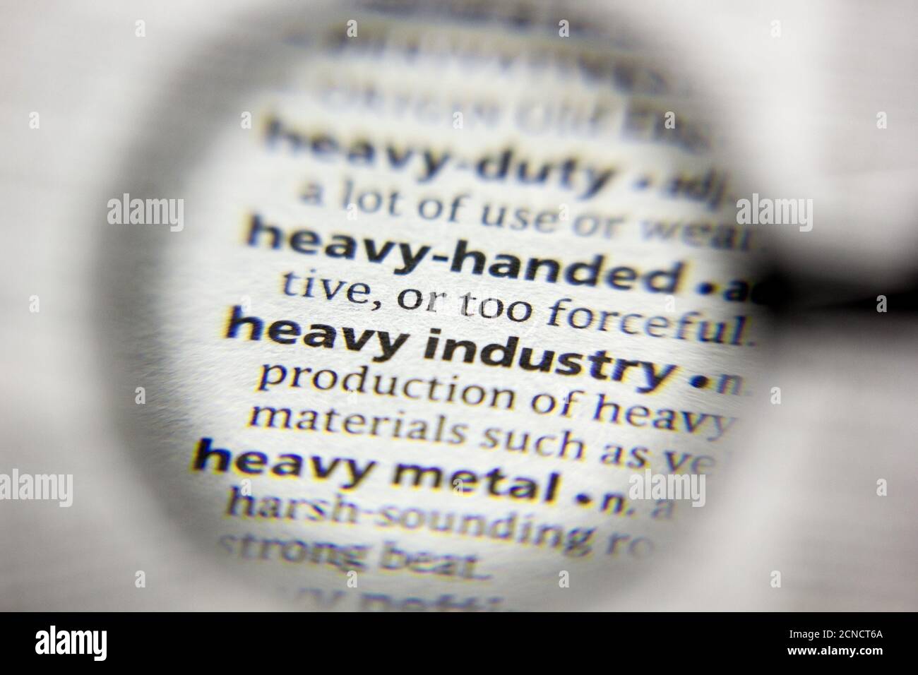 The word or phrase Heavy industry in a dictionary Stock Photo - Alamy
