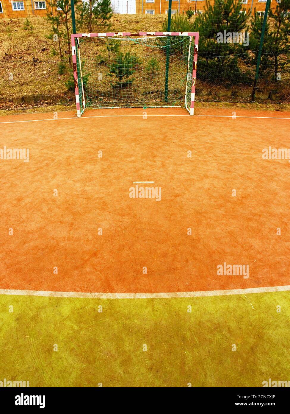 On the football field without goal keeper. Outdoor turf play field. Old ...