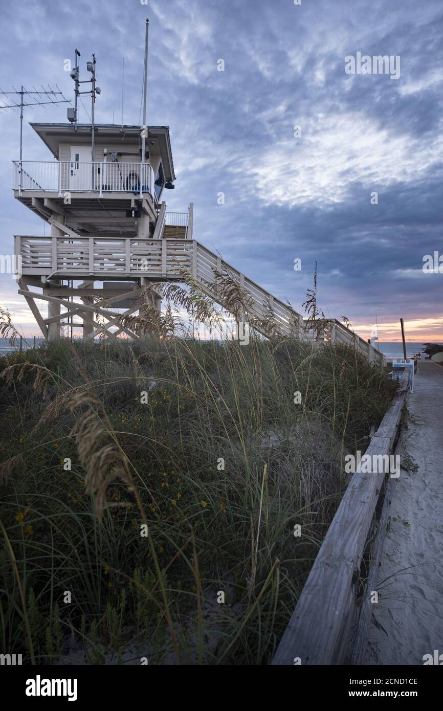 Vertical shot of a tall lifeguard platform at a beach Stock Photo - Alamy