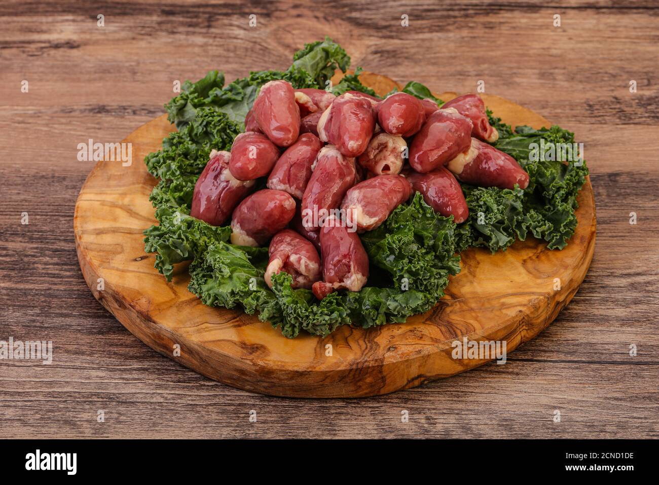 Raw chicken hearts heap for cooking Stock Photo - Alamy