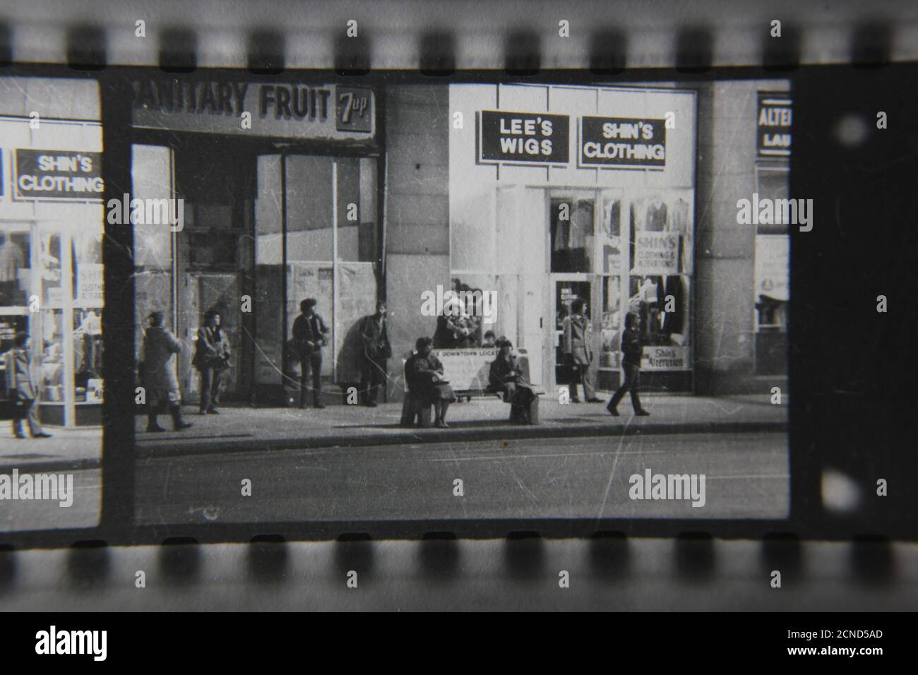 Fine 1970s vintage black and white photography of city bus stop with ...