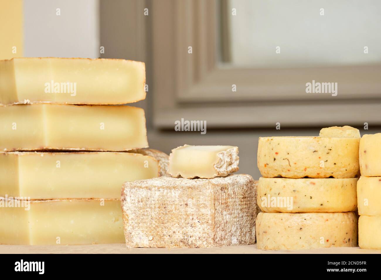 Craft cheese at the fair sale on the counter Stock Photo - Alamy