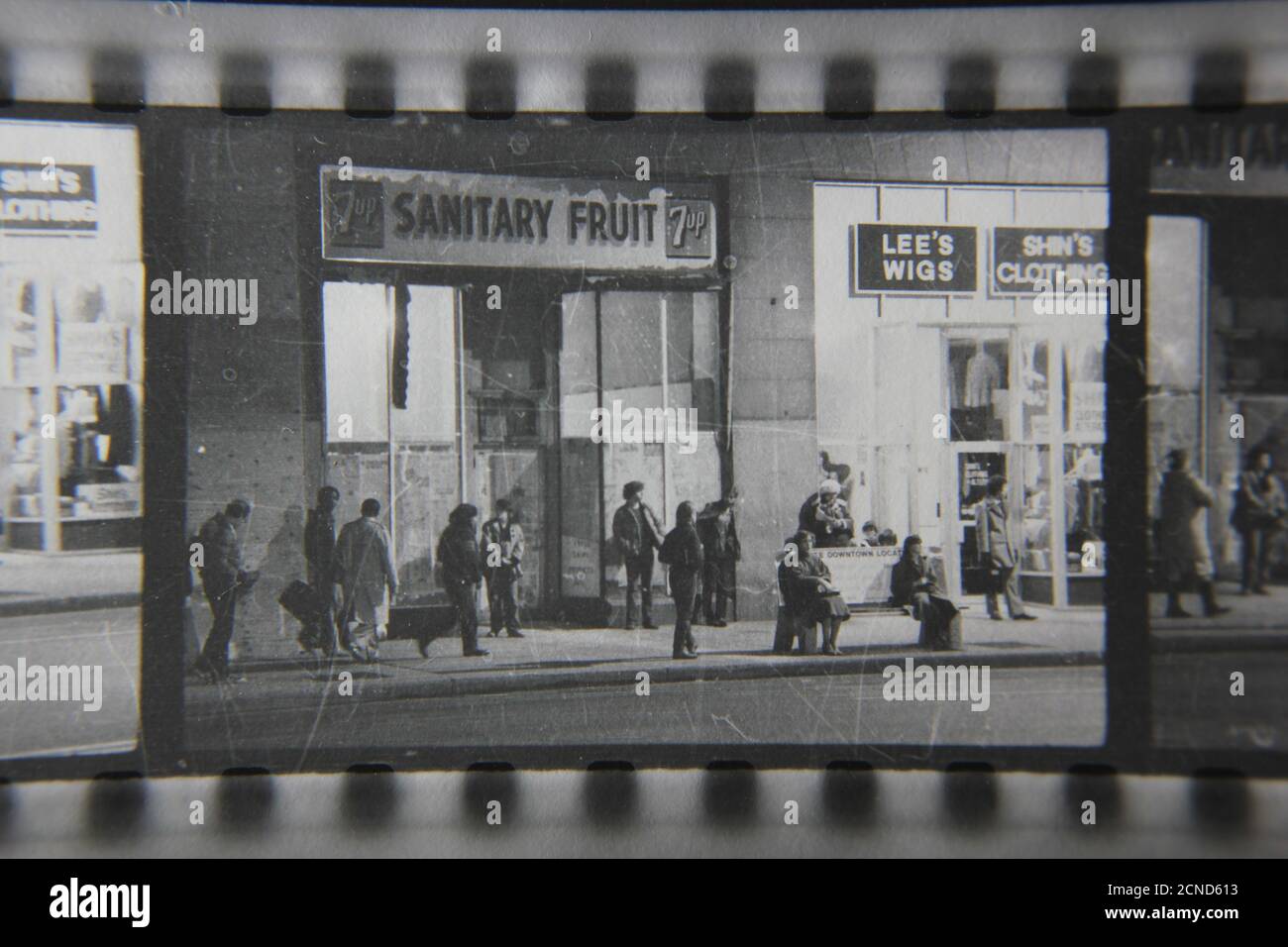 Fine 1970s vintage black and white photography of city bus stop with ...
