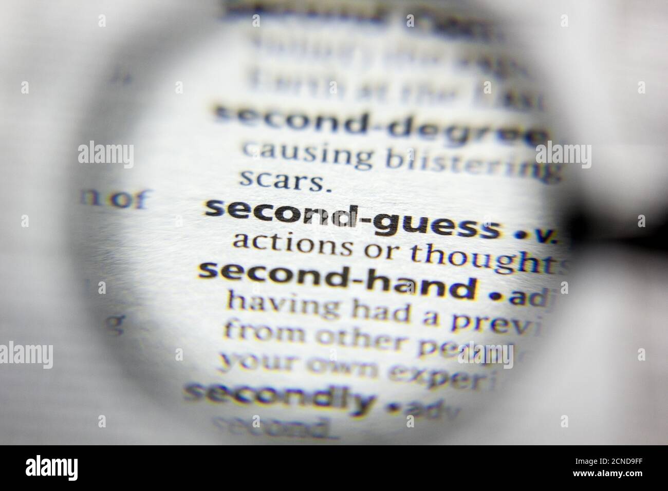 The word or phrase Second-guess in a dictionary Stock Photo - Alamy