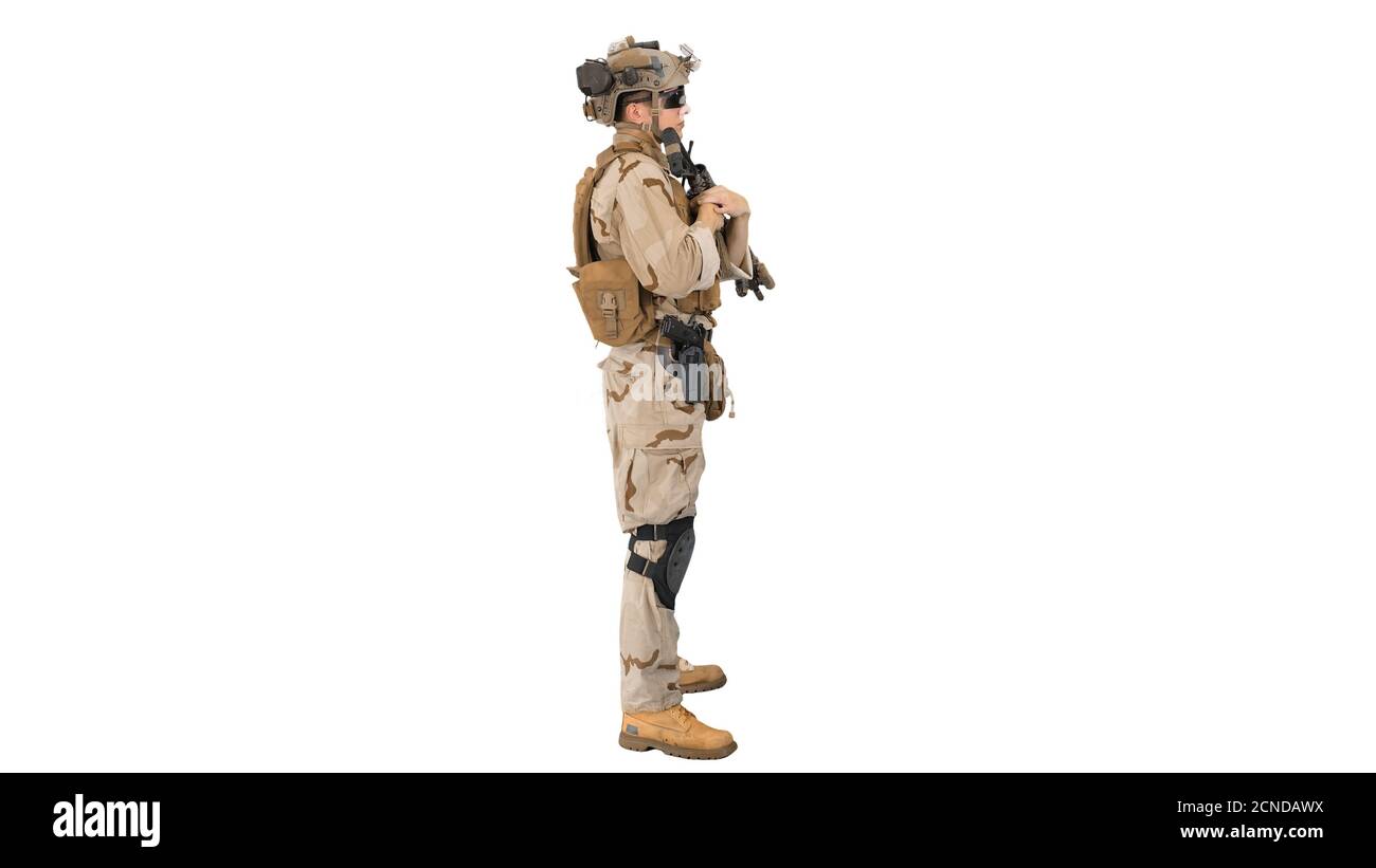Soldier with machine gun standing on white background Stock Photo - Alamy