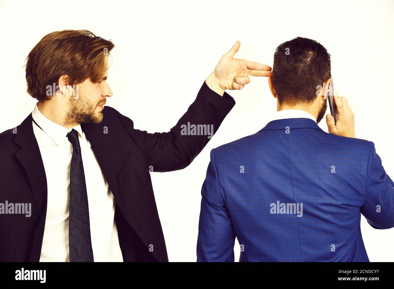 conspiracy, man with gun gesture shooting busy businessman speaking on ...