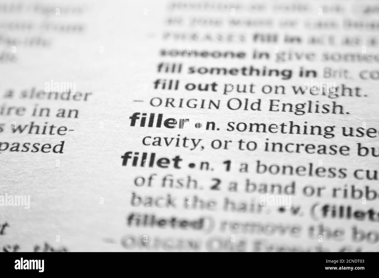 Word or phrase Filler in a dictionary Stock Photo - Alamy