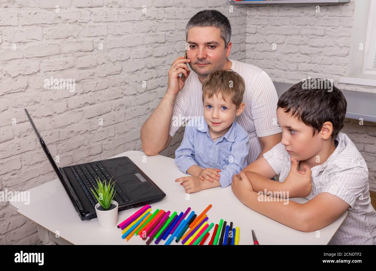 Work home pc man kids hi-res stock photography and images - Alamy