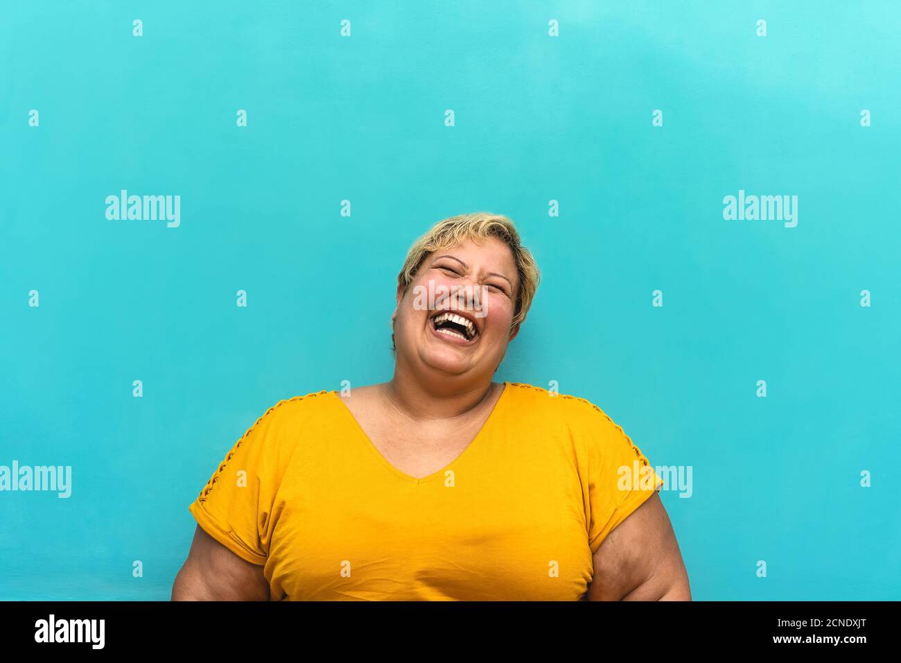 Happy plus size woman portrait - Curvy overweight model having fun ...