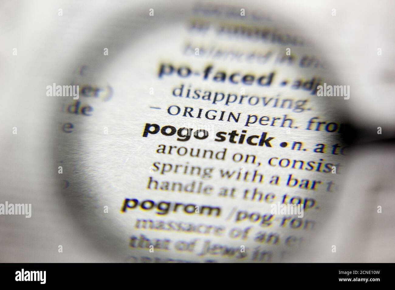 The word or phrase Pogo stick in a dictionary Stock Photo - Alamy