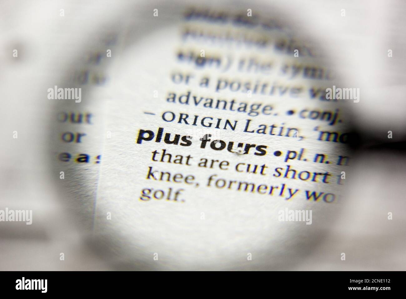 The word or phrase Plus fours in a dictionary Stock Photo - Alamy