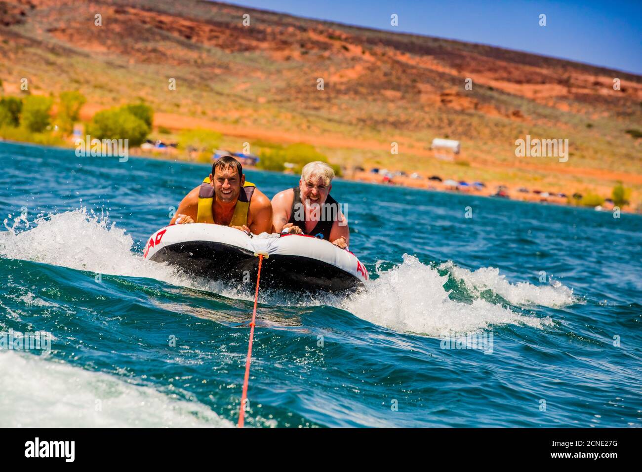 Two friends tubing in Utah, United States of America Stock Photo - Alamy