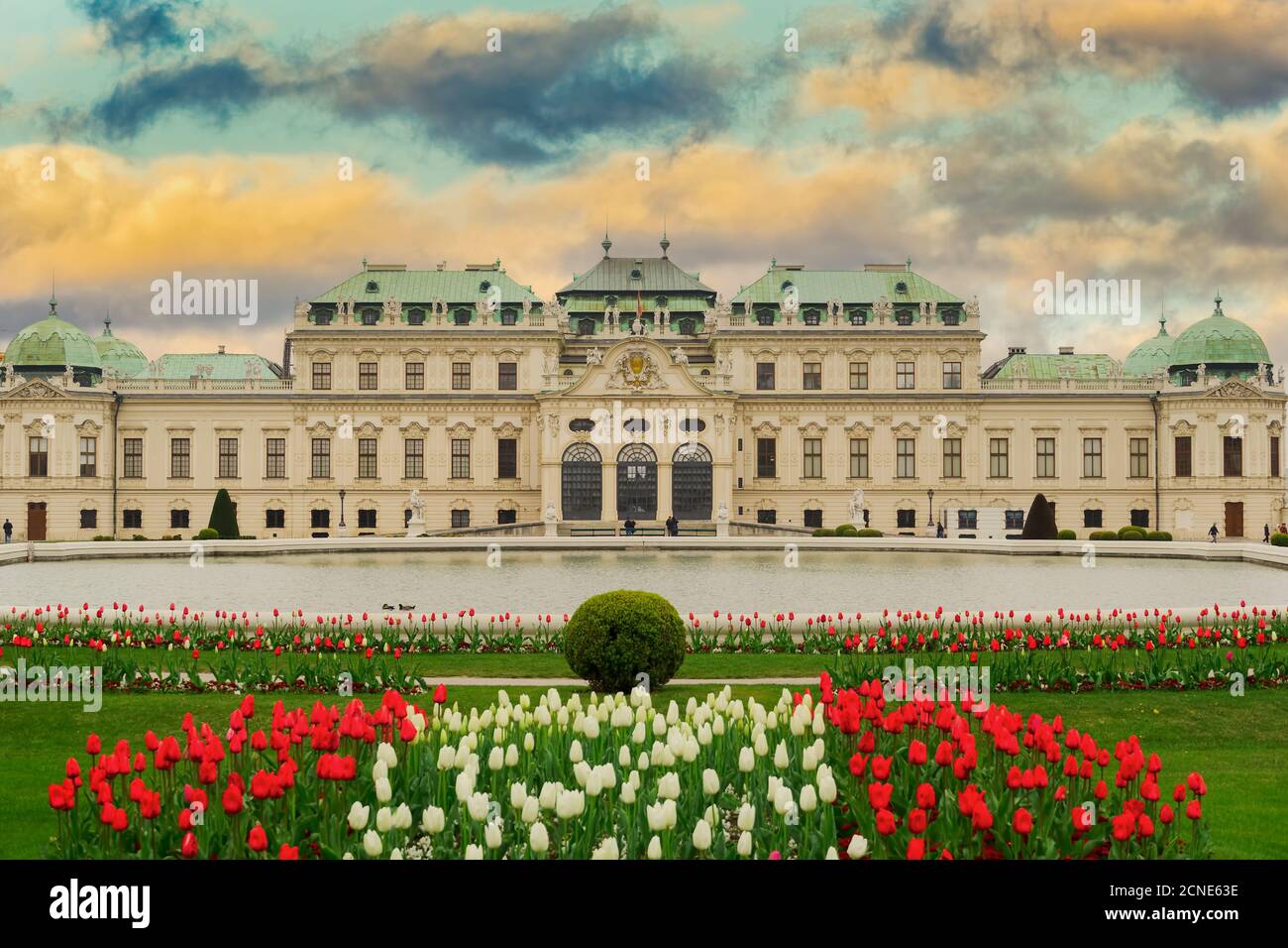 Exterior landscape of 18th century building, with garden flowers and ...