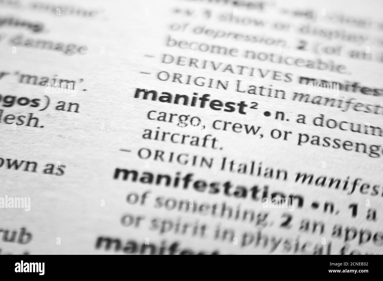 Word or phrase Manifest in a dictionary Stock Photo - Alamy