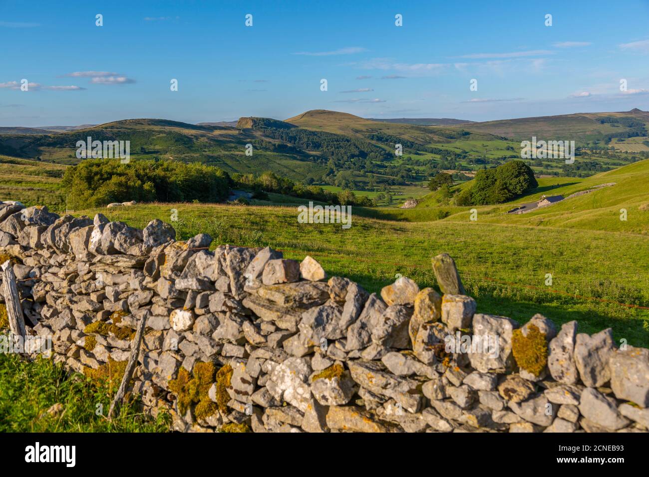 Traditional dry stone wall and view of Hope Valley, Castleton, Peak ...