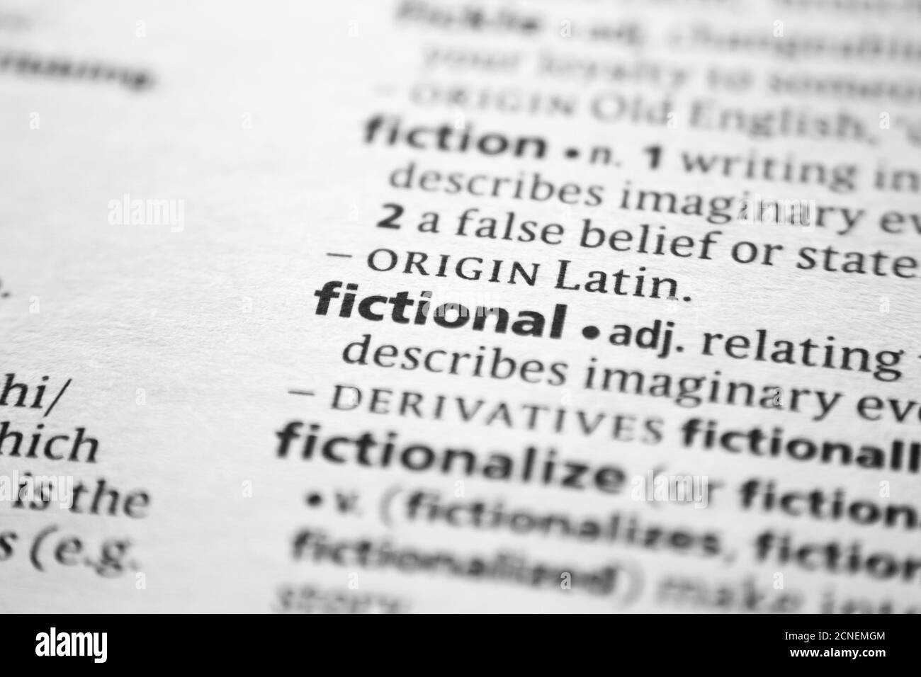 Word or phrase Fictional in a dictionary Stock Photo - Alamy