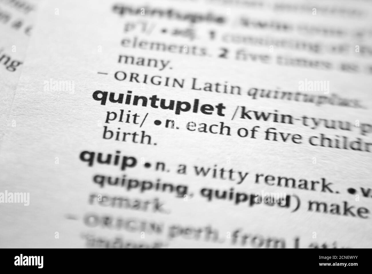 Word or phrase Quintuplet in a dictionary Stock Photo - Alamy