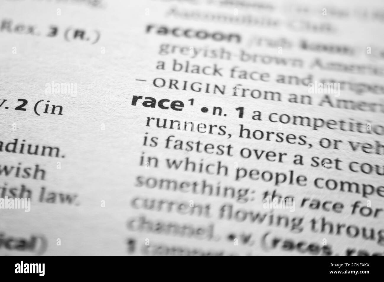 Word or phrase Race in a dictionary Stock Photo - Alamy