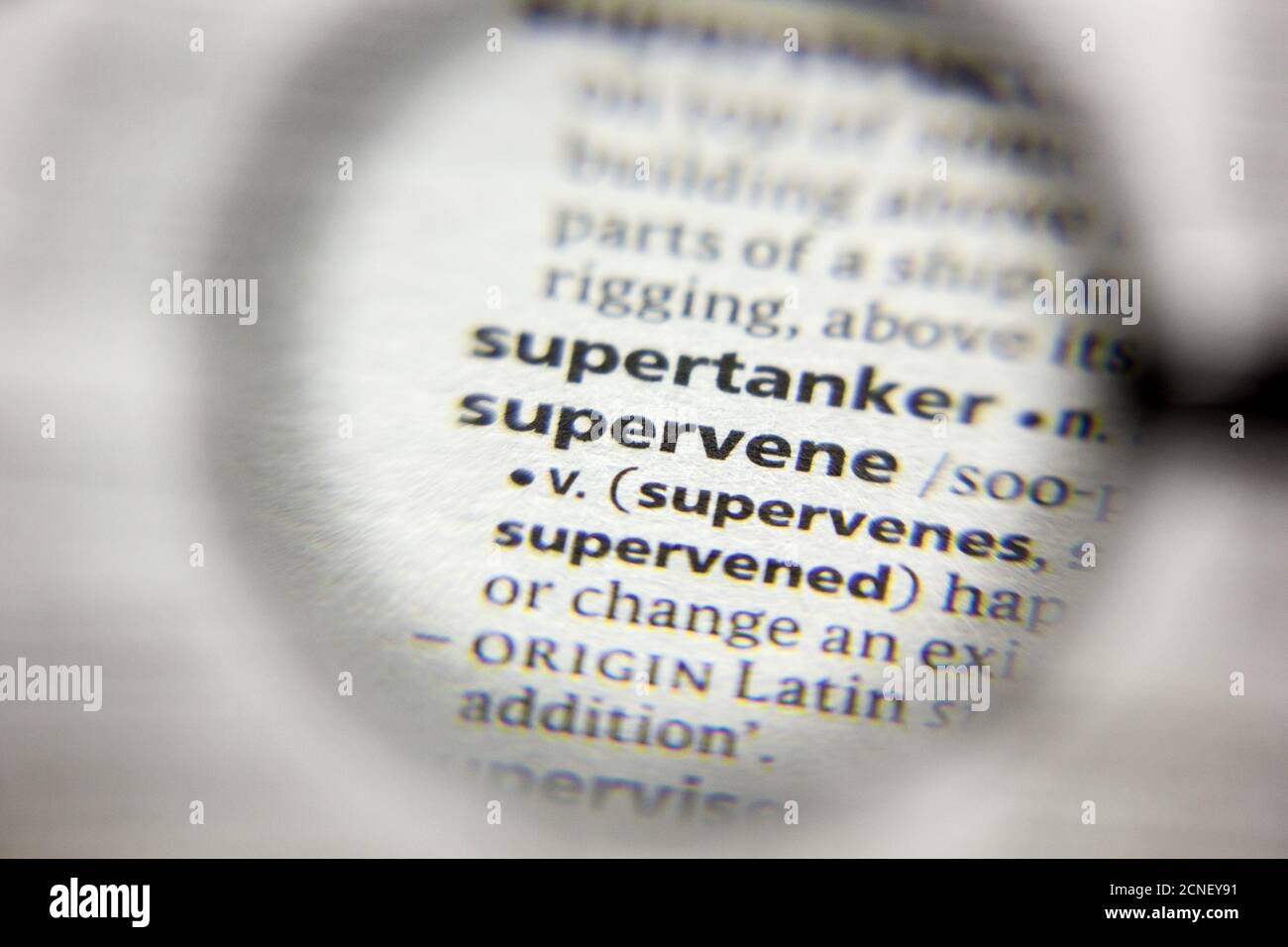 The word or phrase Supervene in a dictionary Stock Photo - Alamy