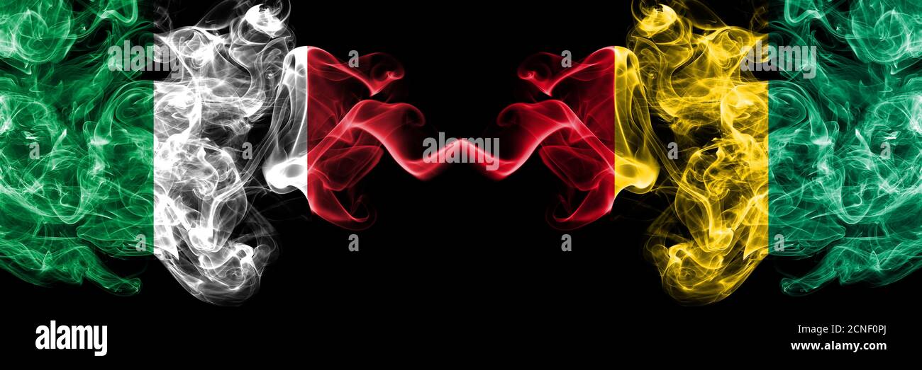 Italy vs Guinea, Guinean smoky mystic flags placed side by side. Thick ...