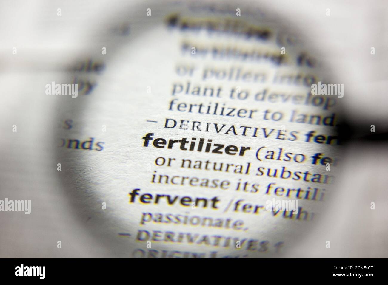 The word or phrase Fertilizer in a dictionary Stock Photo - Alamy